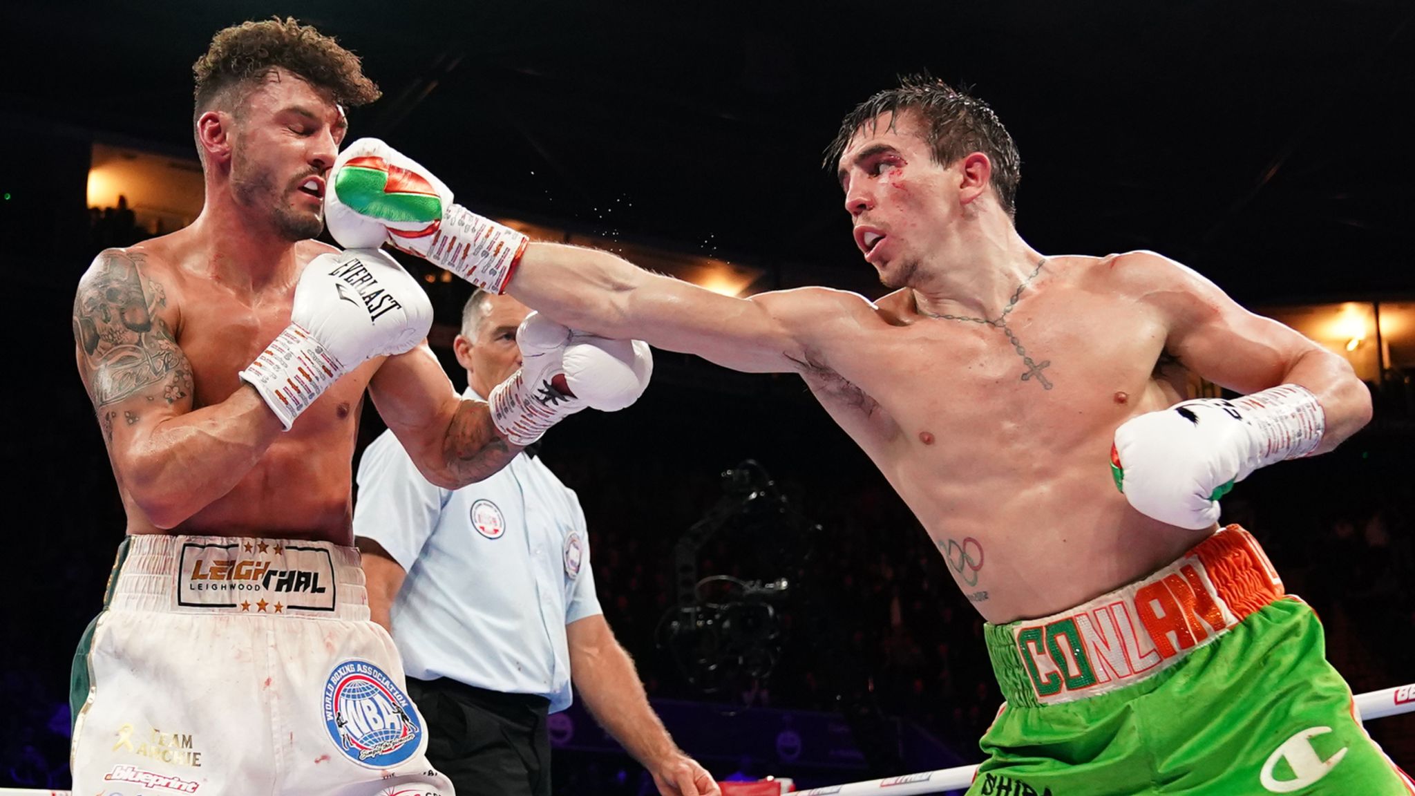 Michael Conlan 'all good' after falling out of ring in loss to Leigh ...