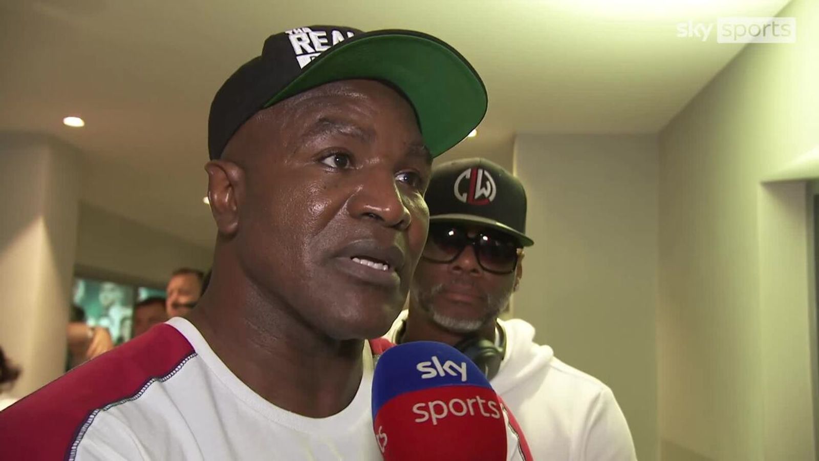 Evander Holyfield urges Anthony Joshua to contain his emotions during ...