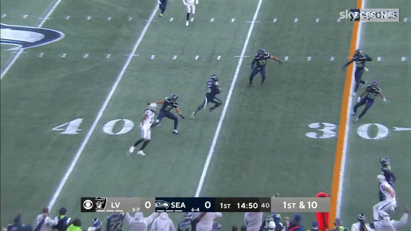 Seattle Seahawks' Darrell Taylor runs on field mid-play to celebrate ...