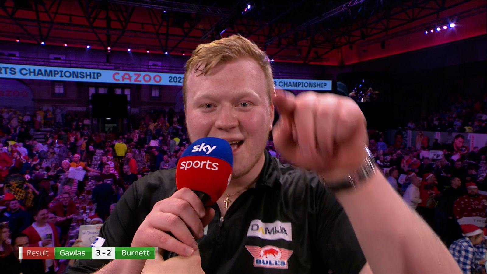 Adam Gawlas conducts the crowd during interview | 'Happy Birthday mum ...