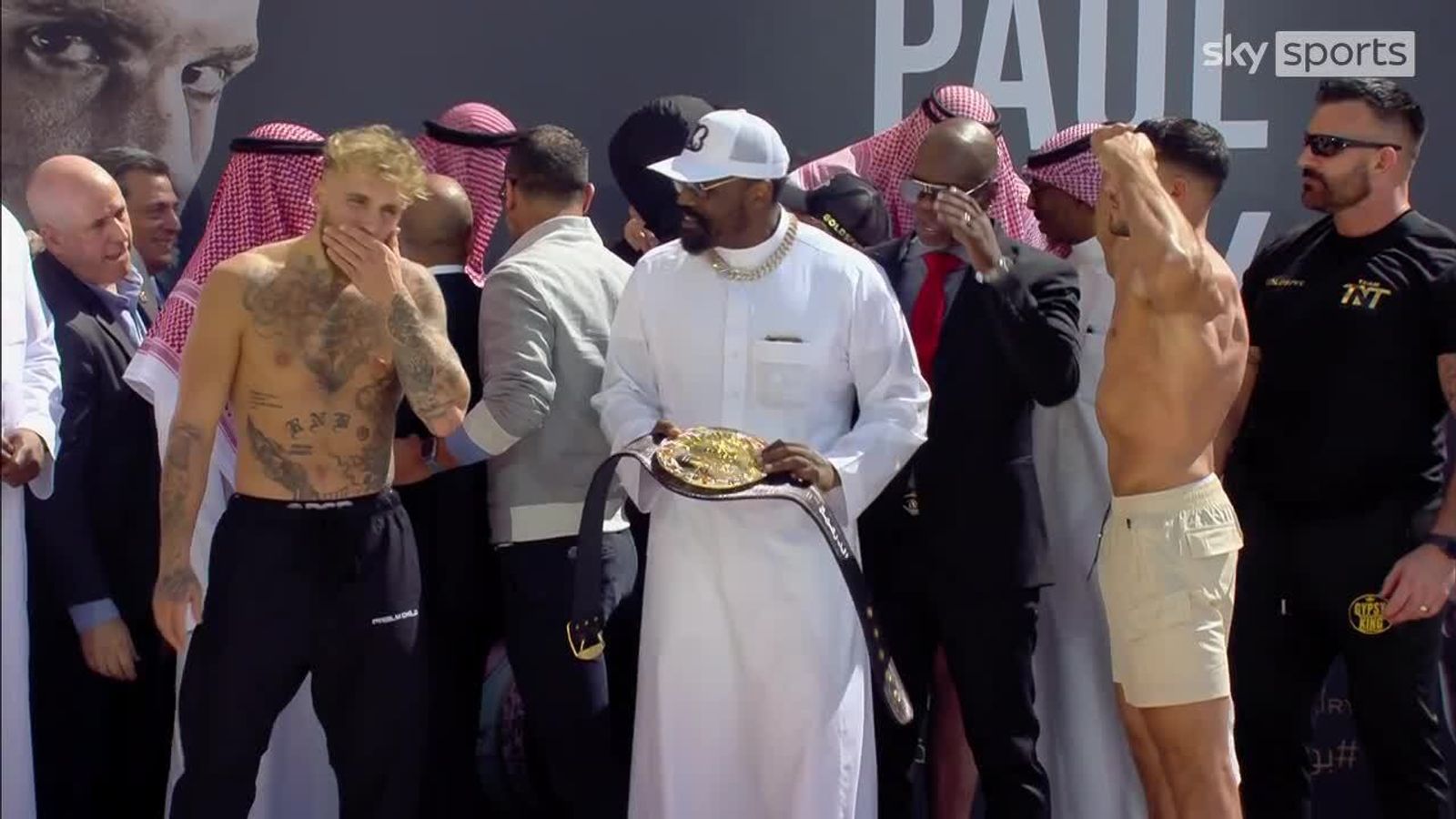 Tommy Fury shoves Jake Paul and flexes muscles at fiery weigh-in | Boxing News | Sky Sports