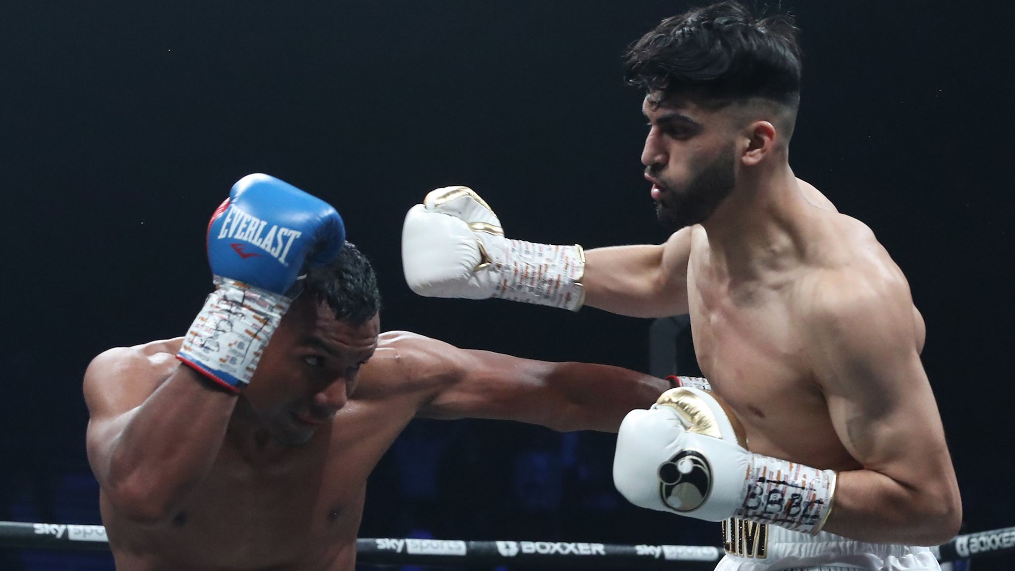 Adam Azim drops and dominates Santos Reyes but goes 10 rounds for first ...