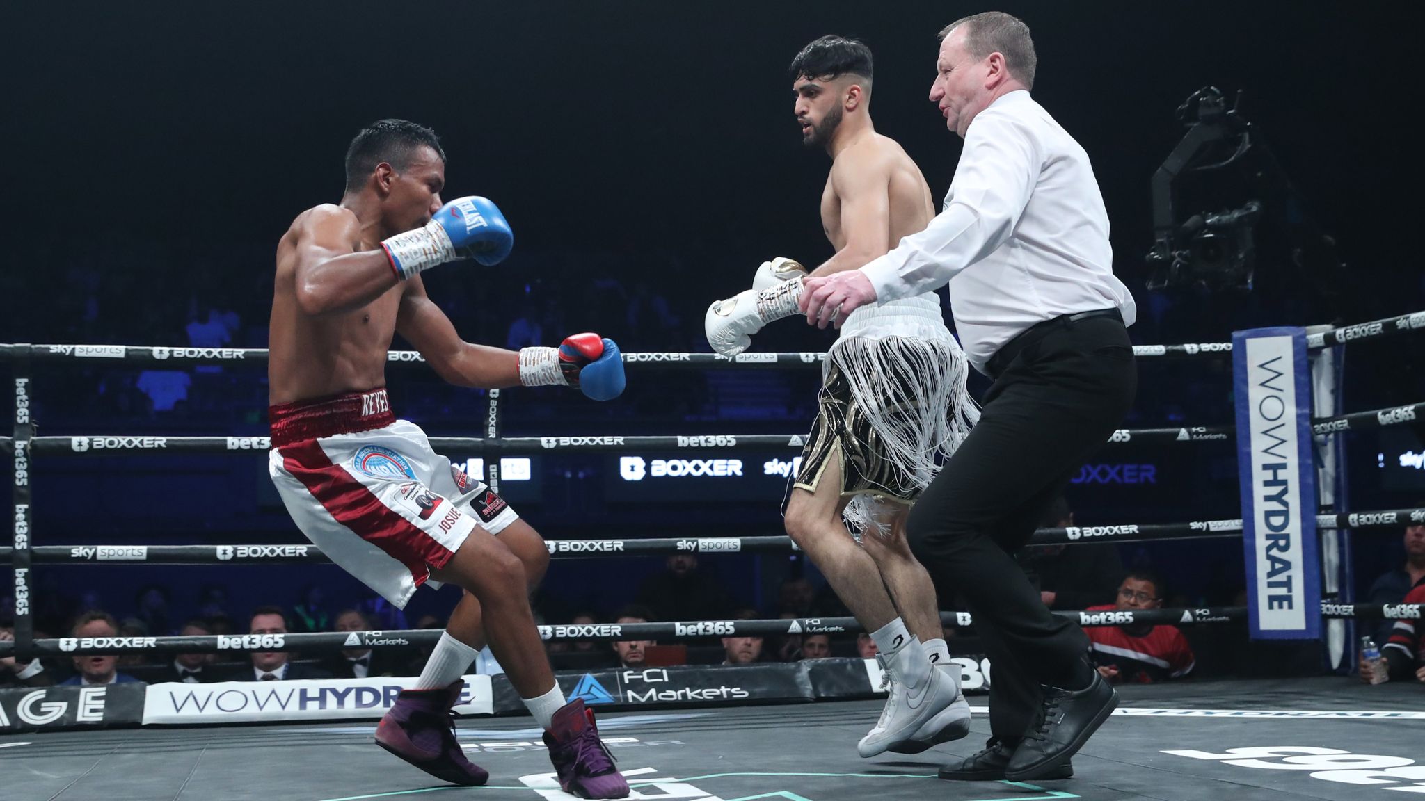 Adam Azim drops and dominates Santos Reyes but goes 10 rounds for first ...