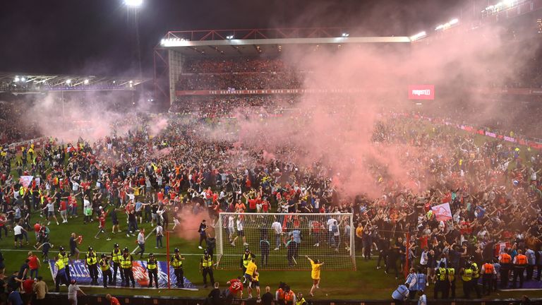 Football authorities warn fans about pitch invasions to avoid repeat of ...