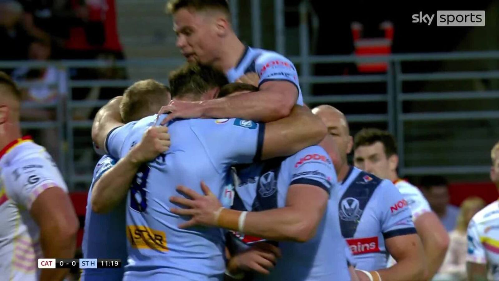 Alex Walmsley lands under the sticks for the first try of the match ...