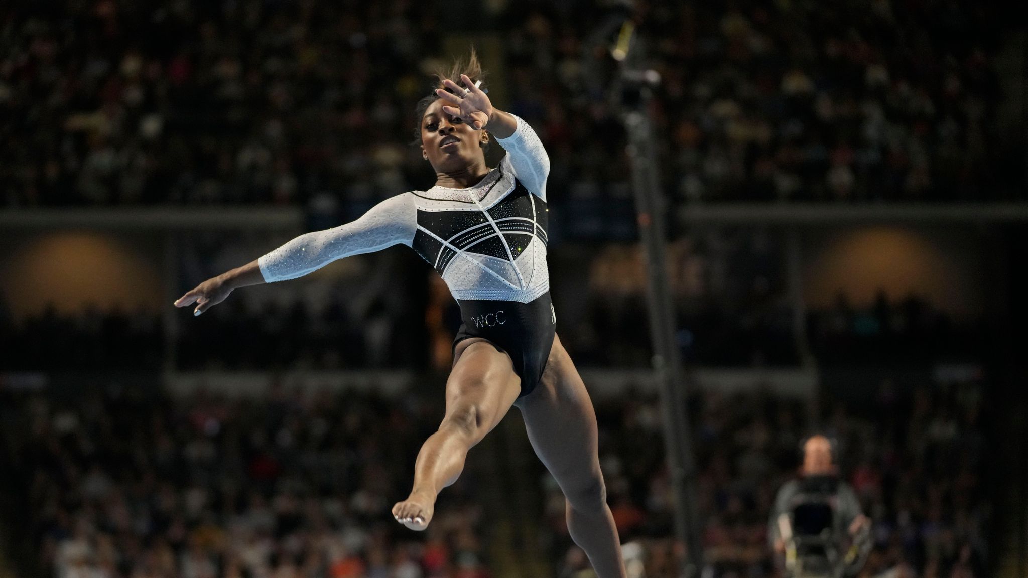 Simone Biles makes winning return after two-year break from gymnastics ...