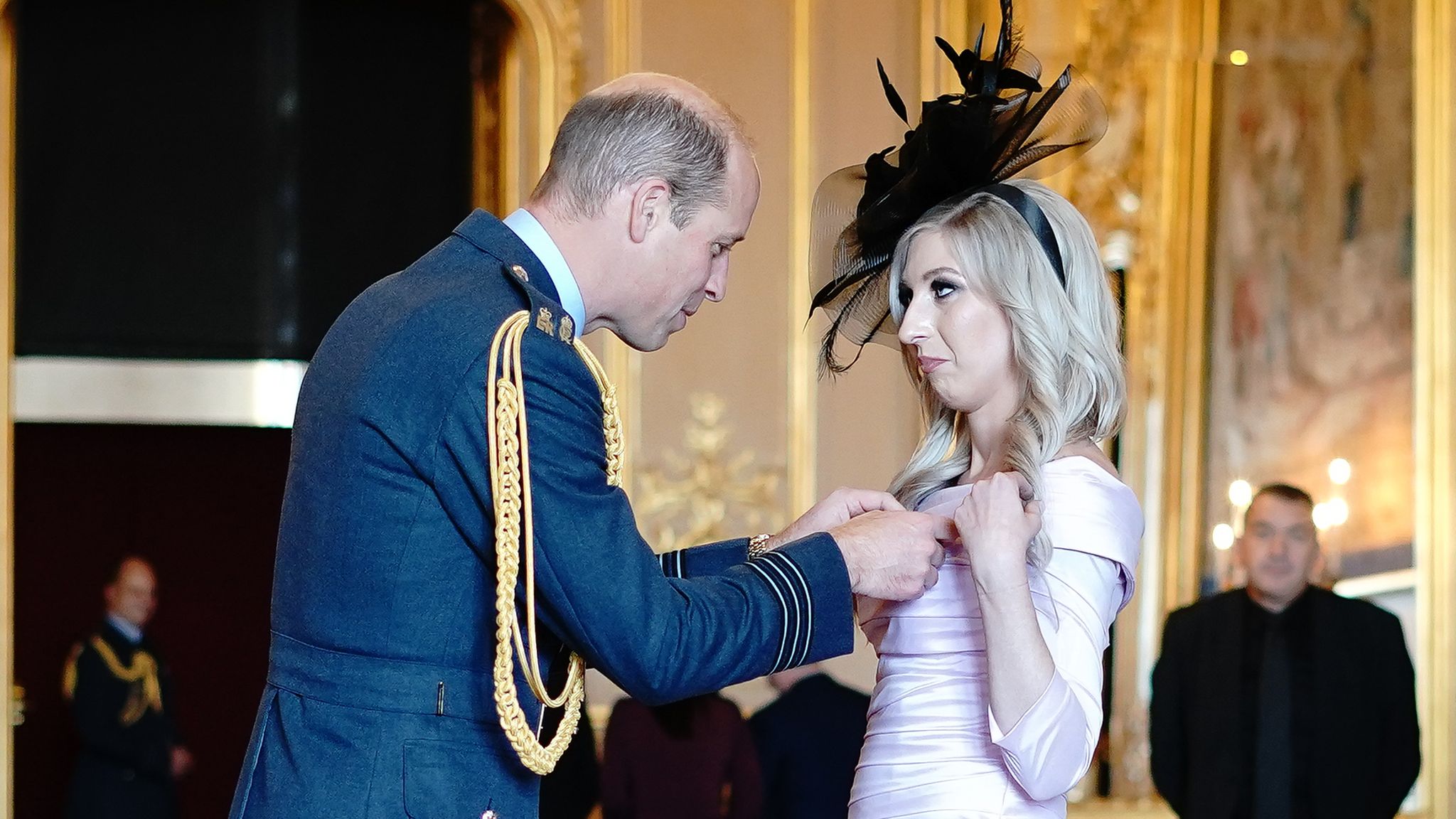 Fallon Sherrock: Pioneering darts star receives her MBE at Windsor ...