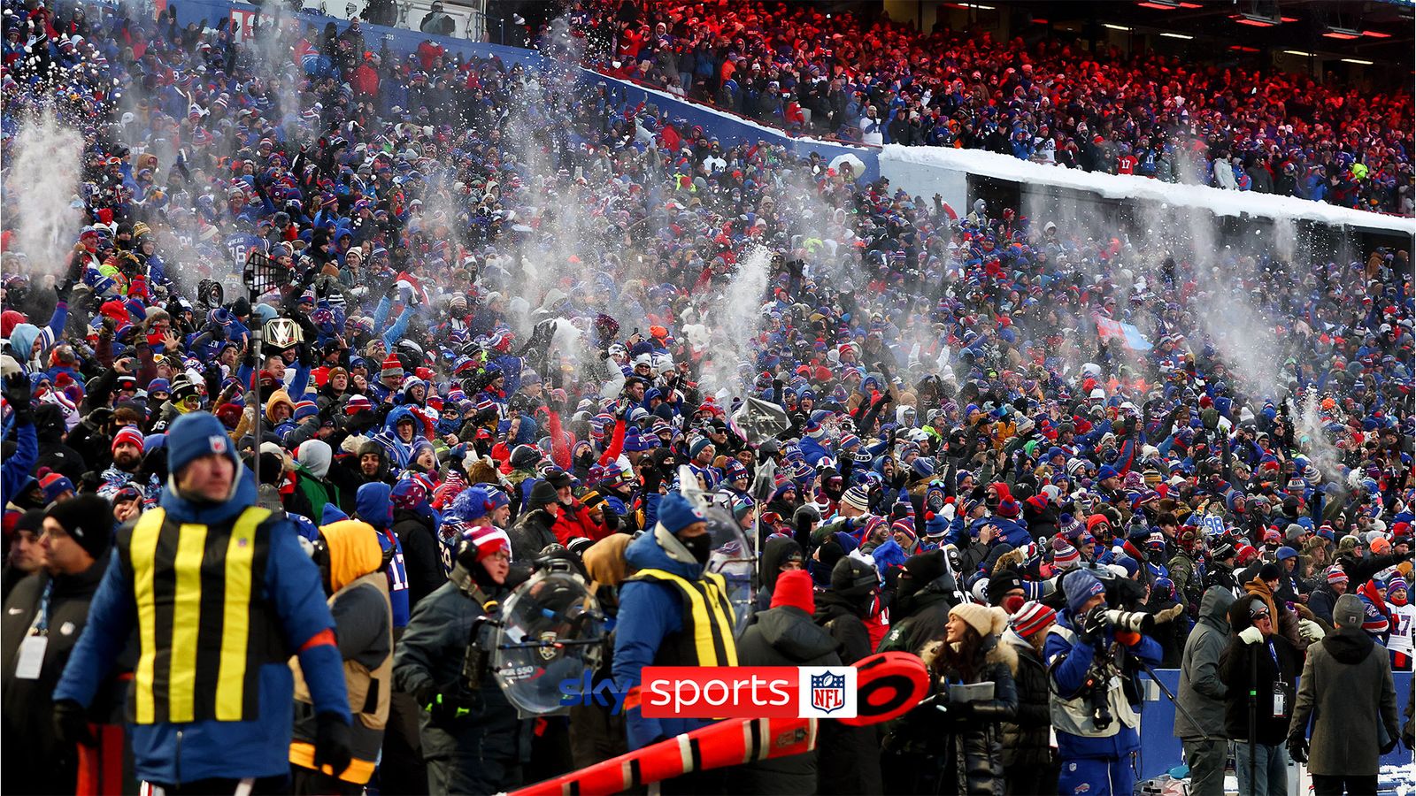 Fans throw snowballs at players during Buffalo Bills interception ...