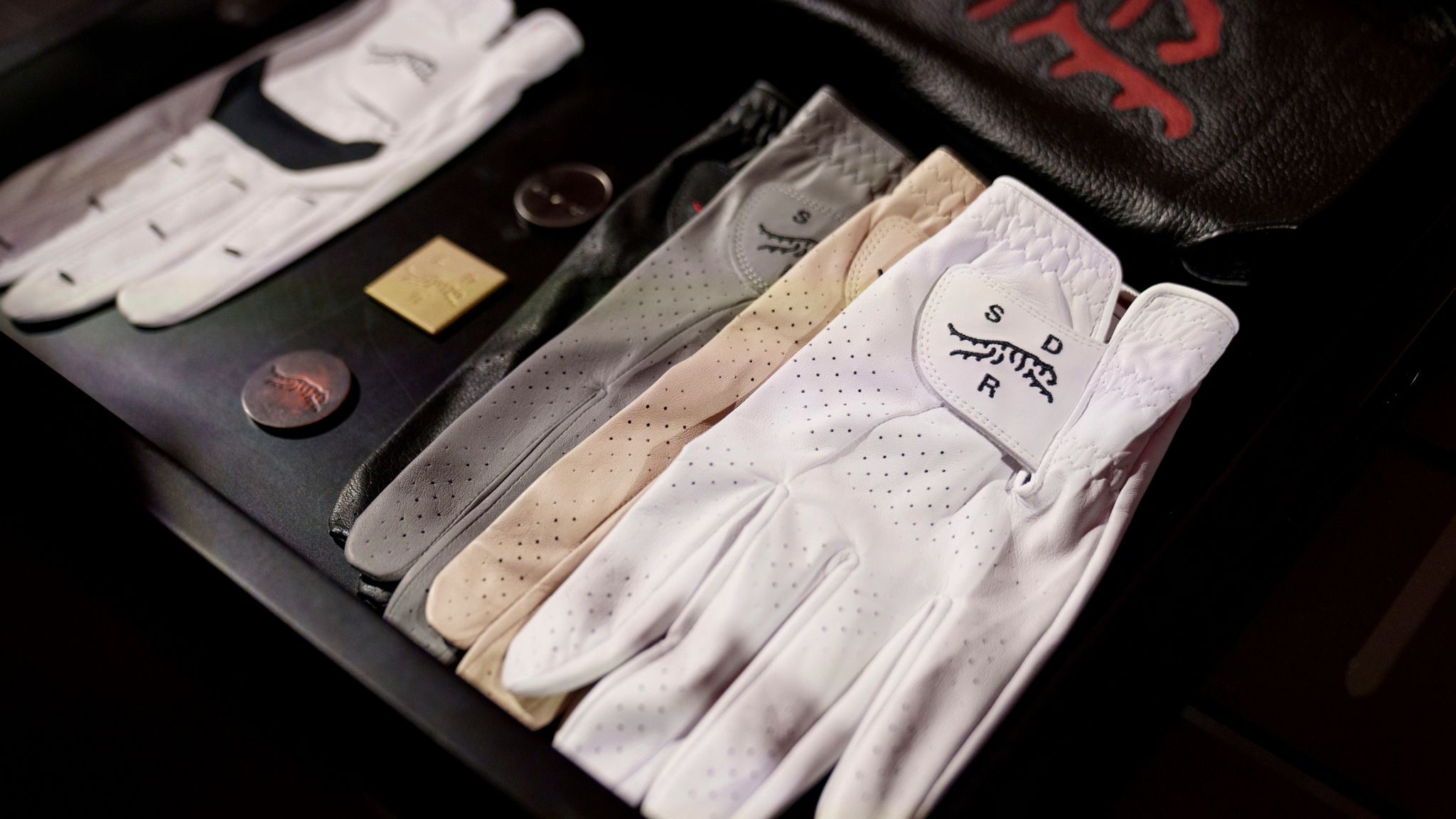 Tiger Woods launches 'Sun Day Red' clothing and footwear line in ...