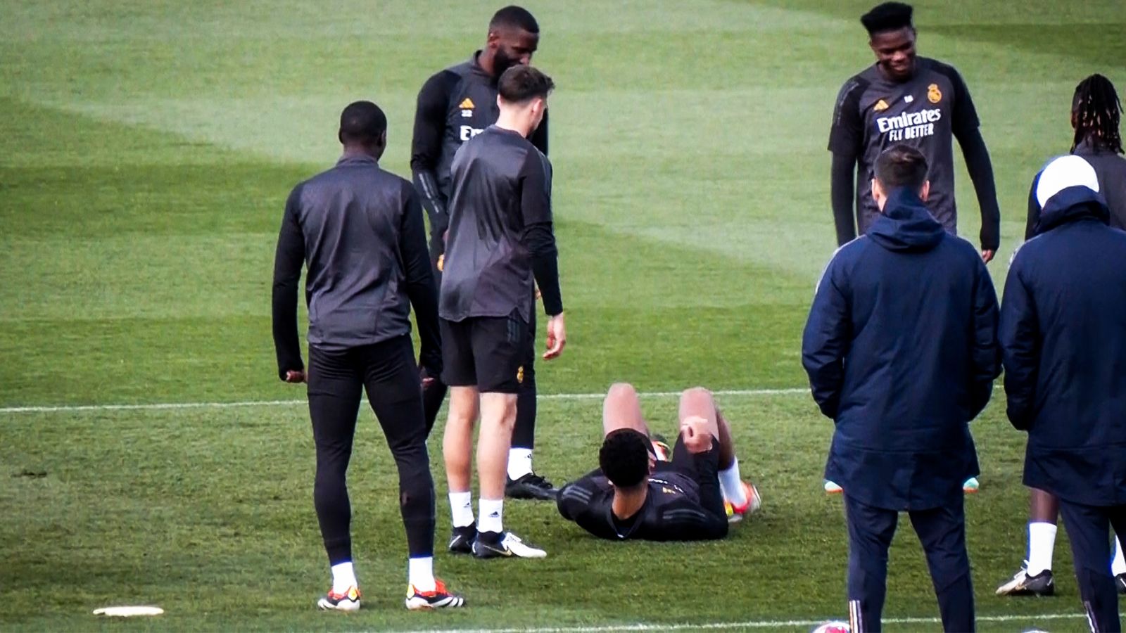 Jude Bellingham wrestled to floor by Antonio Rudiger in Real Madrid ...