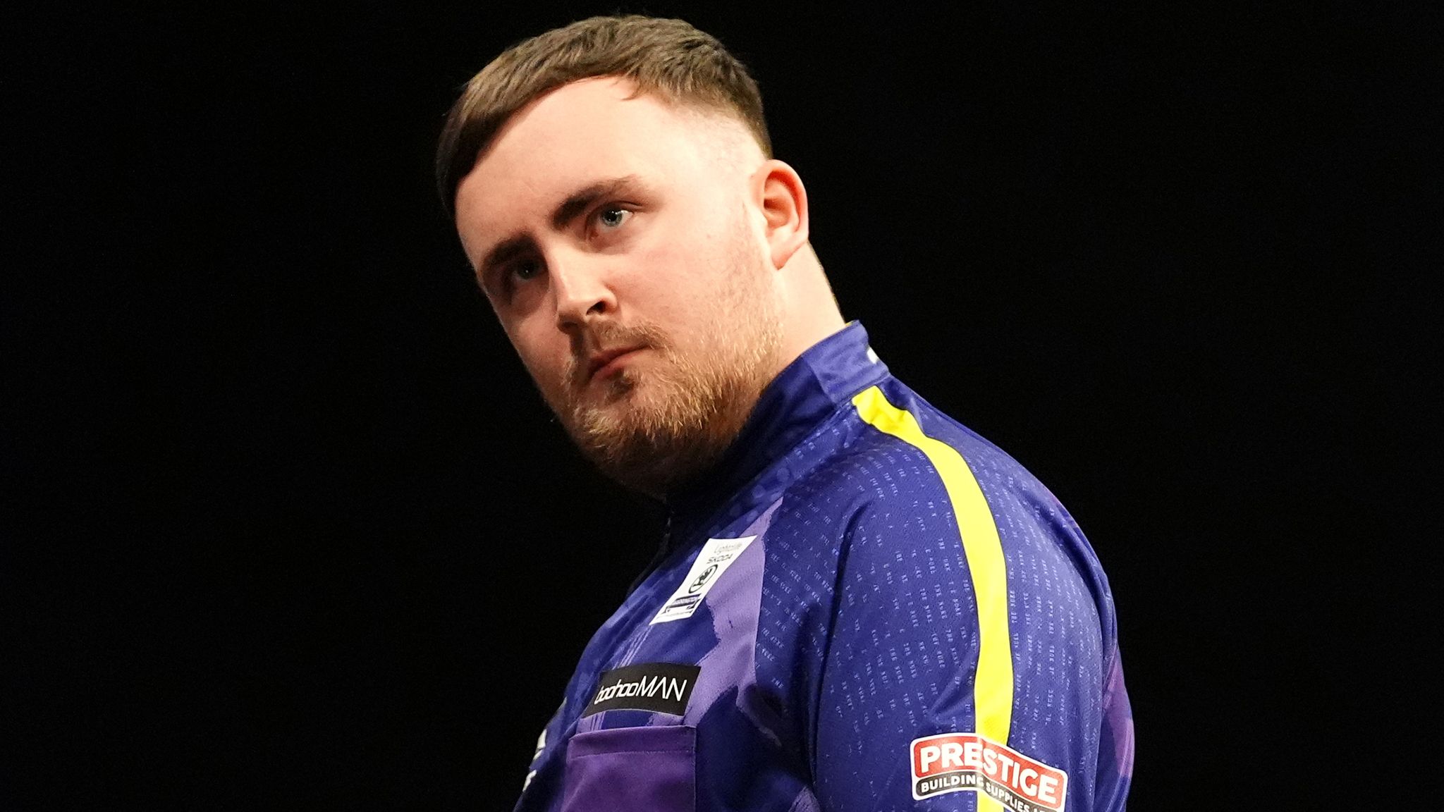 World Series of Darts: Top seed Luke Littler wins tight opener over ...