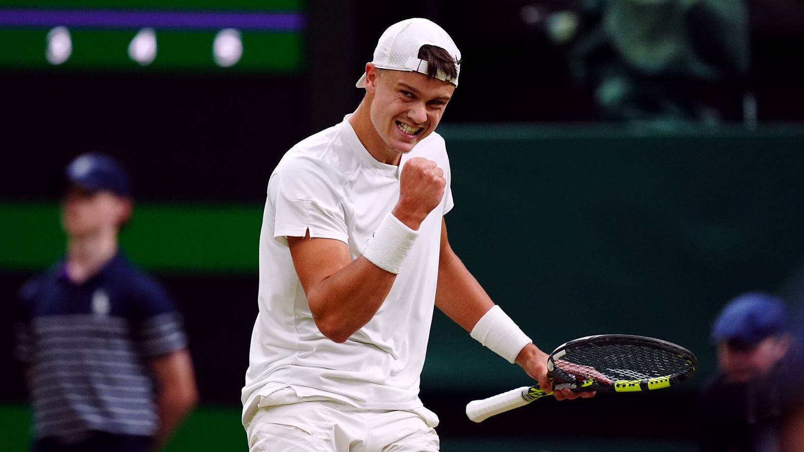 Novak Djokovic sees off Holger Rune to make Wimbledon quarter-finals as Alexander Zverev knocked ...