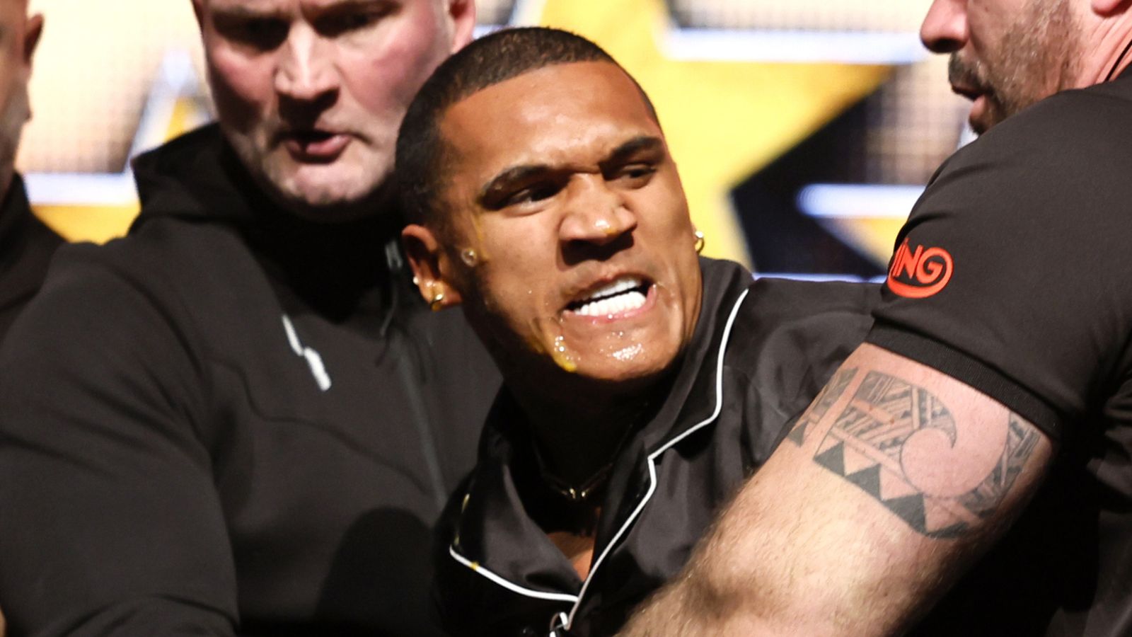 Chris Eubank Jr slaps Conor Benn with an egg during face-off in press ...
