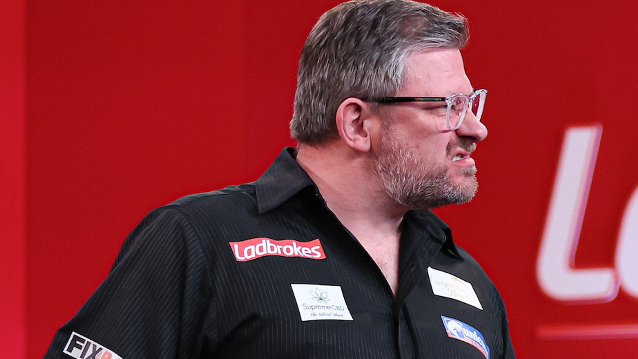 UK Open darts: Luke Littler cruises to TV title after thrashing James Wade in one-sided final in ...