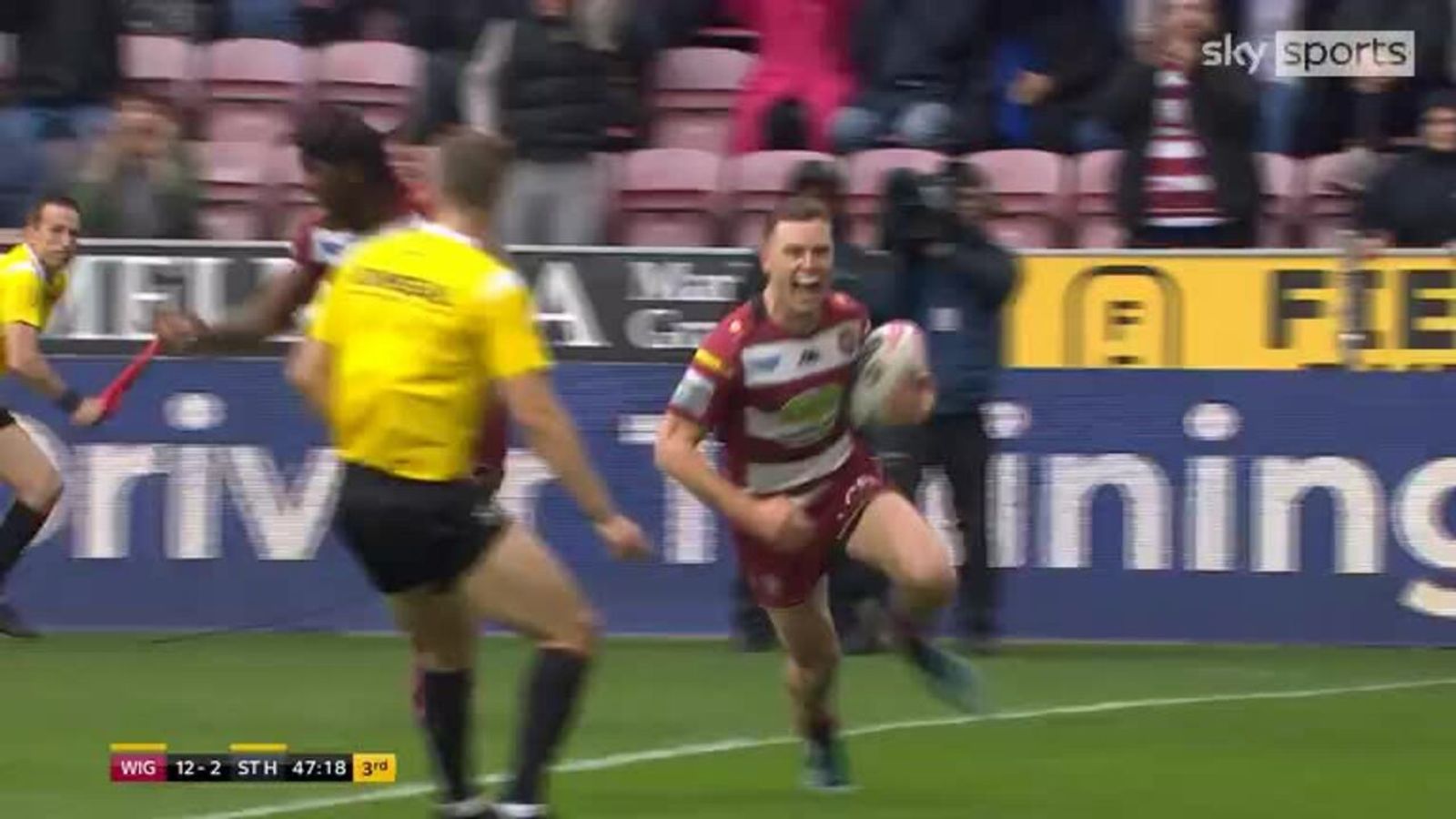 Jai Field scores his second try for Wigan from close range as they ...