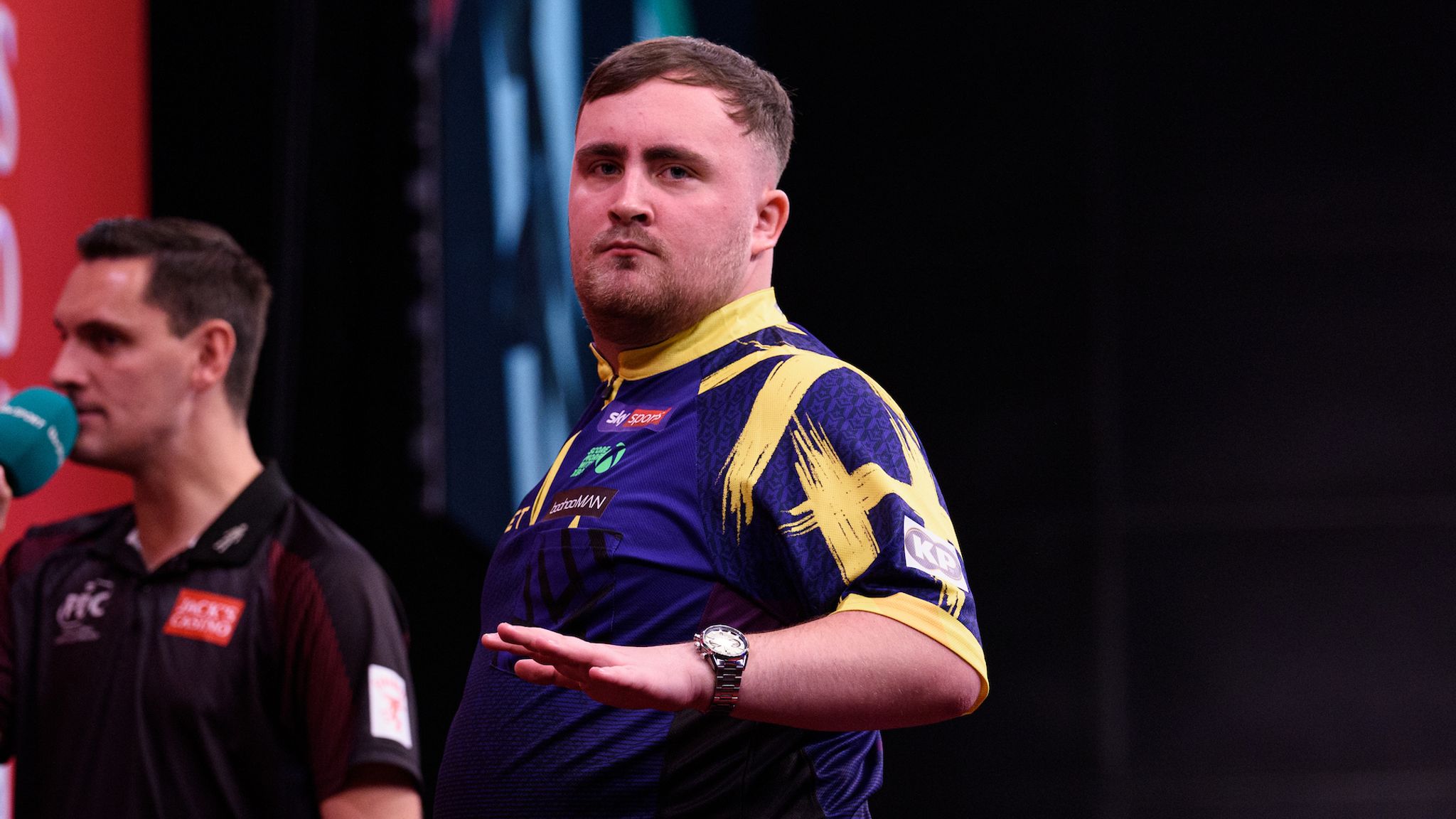 World Series of Darts Finals: Luke Littler fights back to book quarter ...