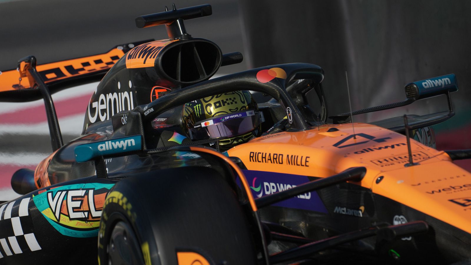 Lando Norris in golden crash helmet but car number one switch waits at ...