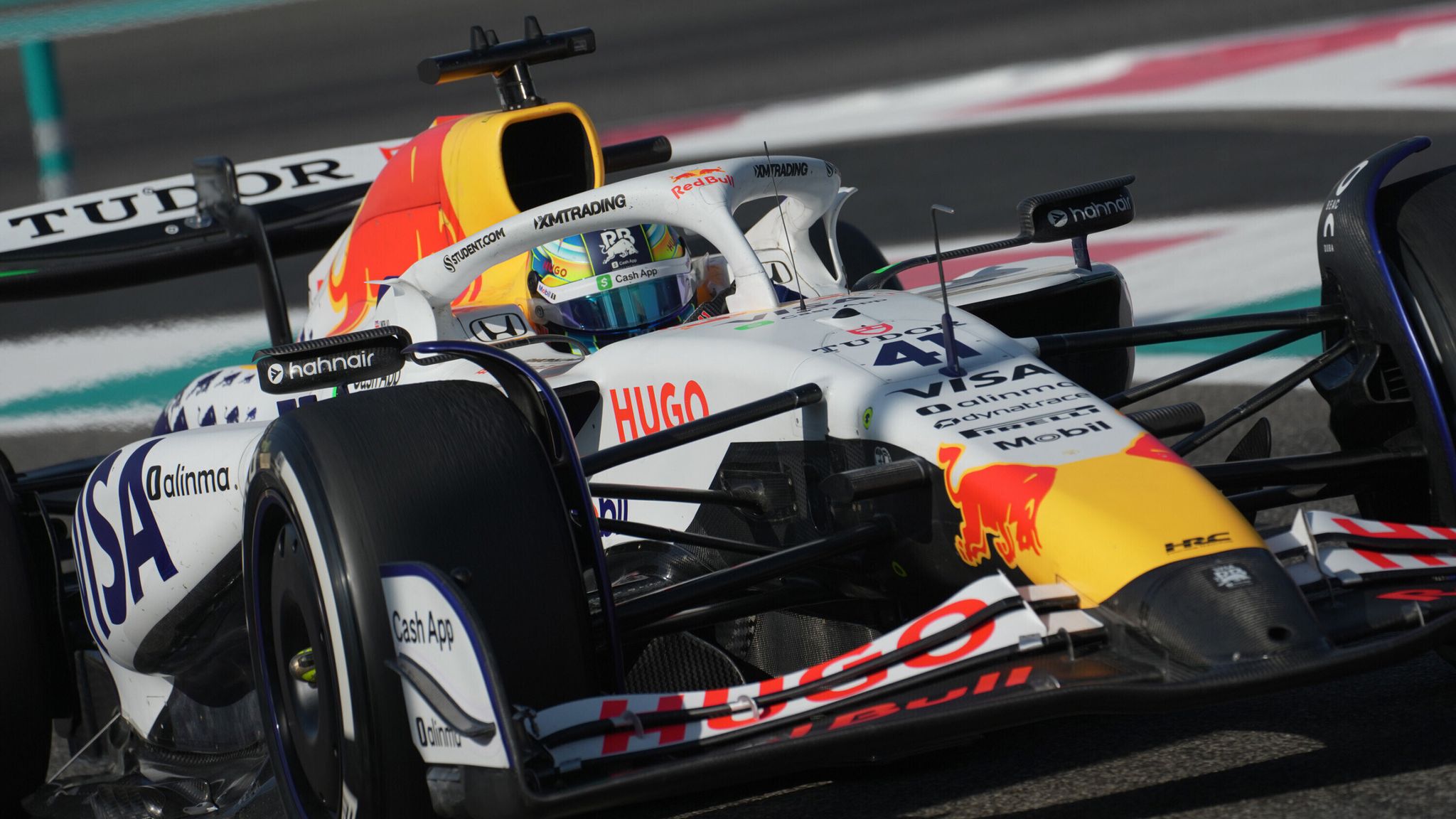 Lando Norris in golden crash helmet but car number one switch waits at ...
